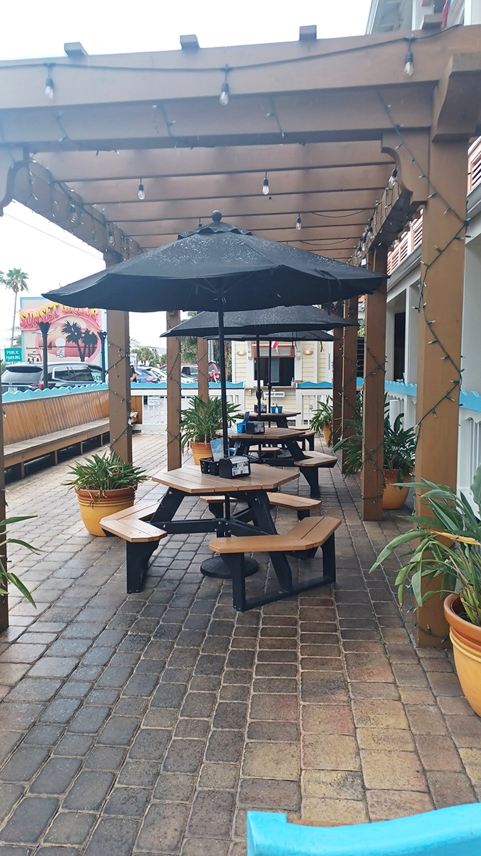 Patio paradise: Where string lights and sea air create the perfect ambiance for memory-making meals.