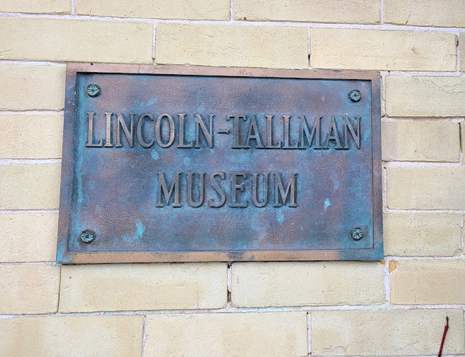 If walls could talk, they'd probably just point to this sign. Less cryptic than a Dan Brown novel, but way more historically accurate.