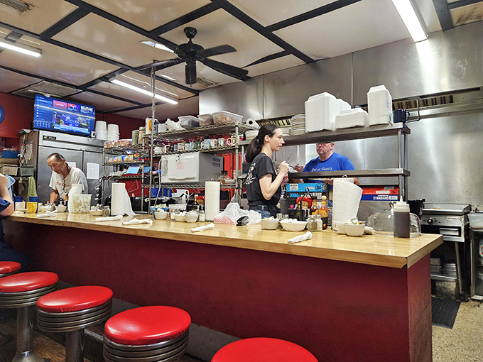 The breakfast dream team in action! These culinary wizards work their magic, turning simple ingredients into morning masterpieces.