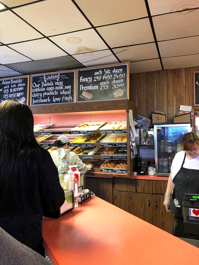 Where the magic happens! Avon's wizards of dough work their spellbinding craft, turning simple ingredients into rings of pure bliss.