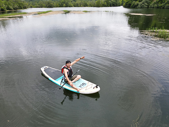 Surf's up in Illinois? This paddleboarder proves you don't need an ocean to ride the waves of adventure at Kickapoo.