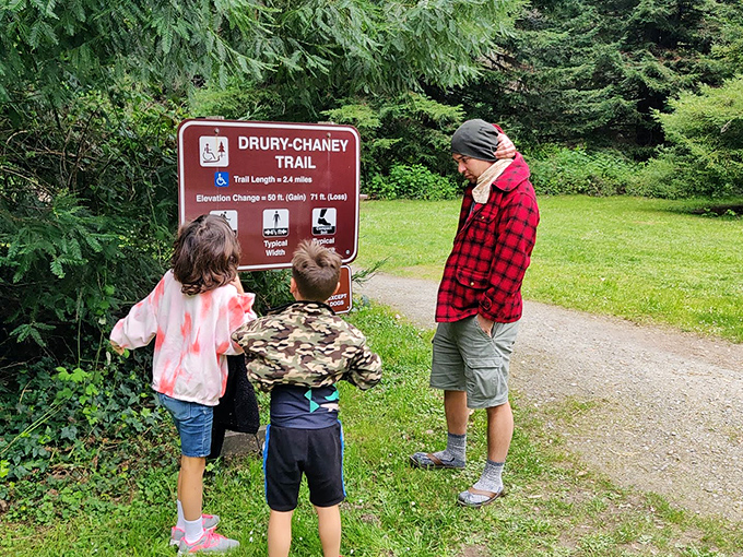Family bonding, redwood style: Nothing says "quality time" like deciphering trail signs together in the great outdoors.