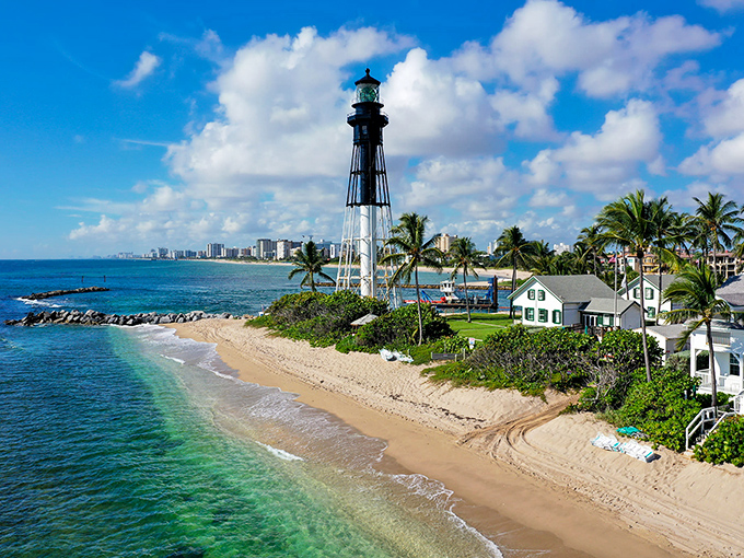 Crystal-clear waters, powdery sand, and a lighthouse standing sentinel – it's like someone bottled the essence of "vacation" and poured it right here.