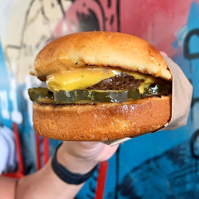 A burger that's more stacked than a Jenga tower. One bite, and you'll forget all about those fancy, big-city burgers.