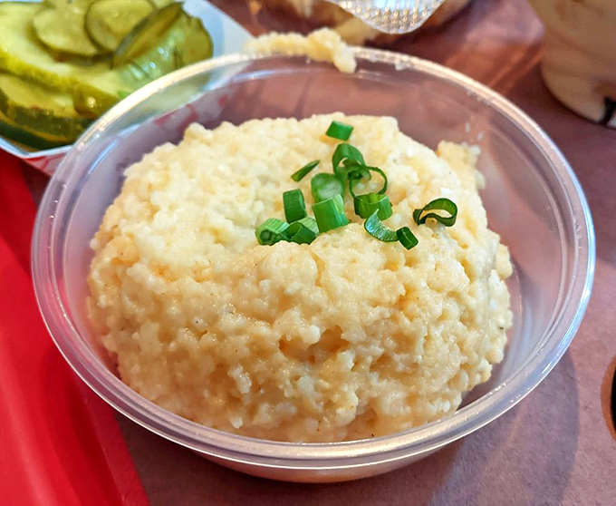 Cheesy grits so creamy, they'd make a Southerner weep with joy. It's like a warm, cheesy hug for your insides.