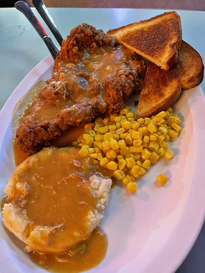 Behold, the chicken fried steak! It's comfort food that gives you a warm hug while whispering, "Diet? What diet?"