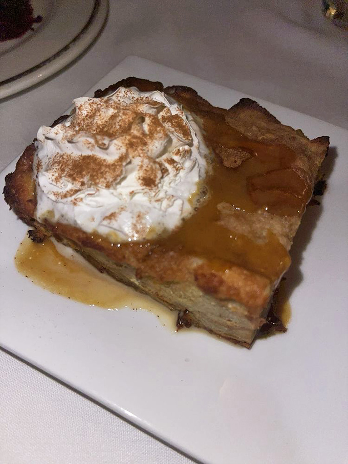 Bread pudding or cloud nine? This cinnamon-kissed slice of heaven might just make you believe in love at first bite.