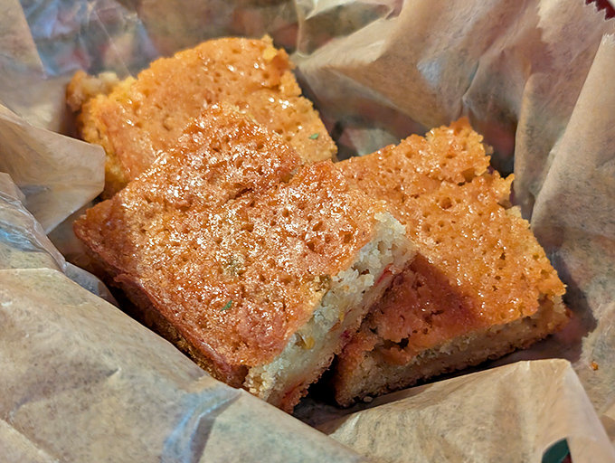 Cornbread so good, it should be illegal. Golden, crispy, and ready to soak up every last drop of sauce on your plate. Carb-counters, avert your eyes!
