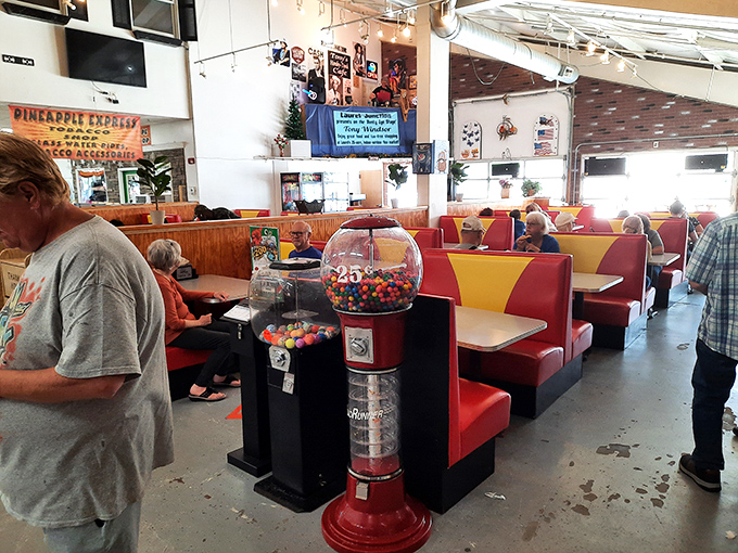 Retro diner vibes meet flea market chic. This dining area is serving up nostalgia with a side of people-watching. Don't forget to try the special!