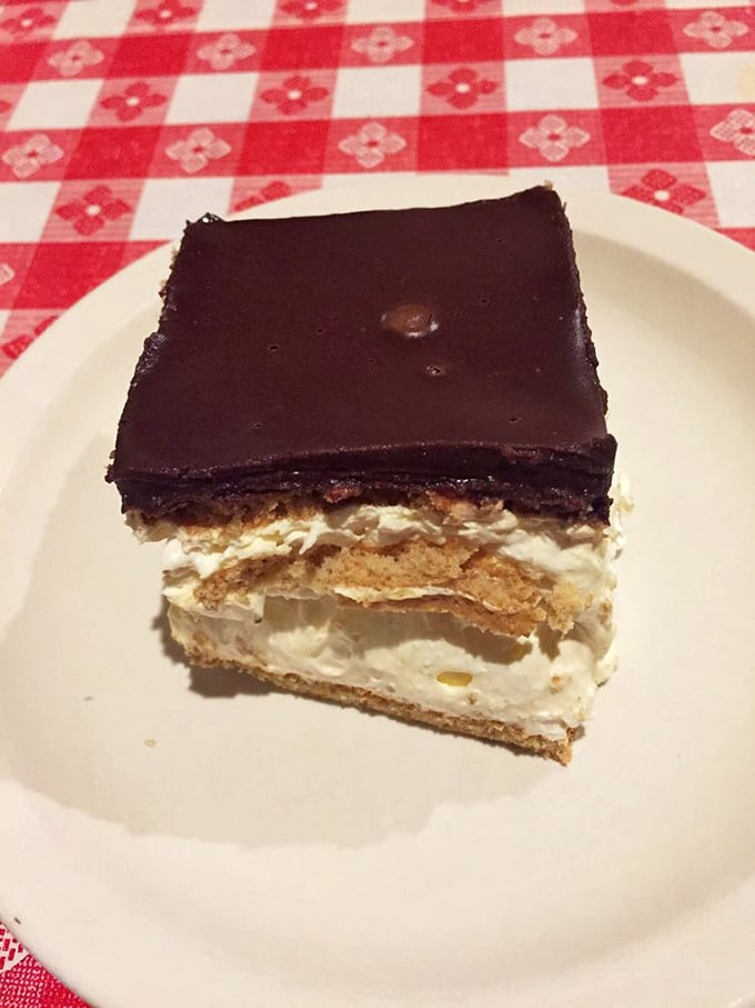 Eclair cake: because after conquering a steak the size of your head, you deserve a sweet victory lap. It's layers of deliciousness that'll make you forget about your belt-loosening woes.