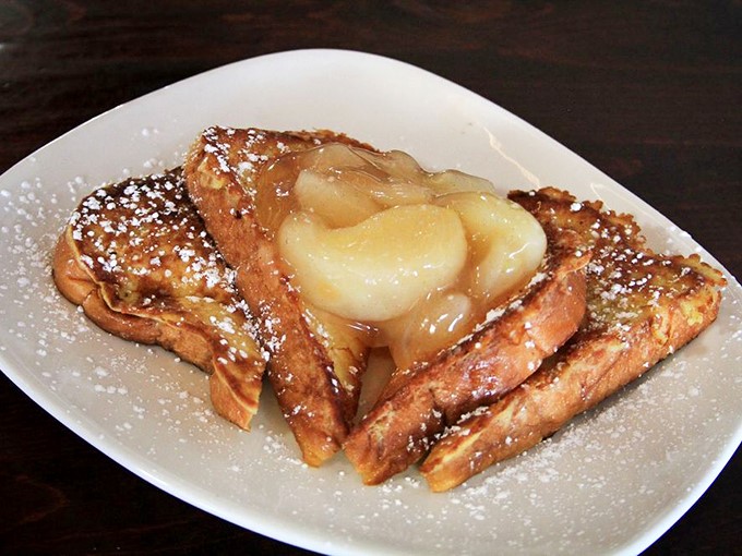 French toast that's dressed to impress! Topped with a cascade of fruit, it's like breakfast decided to go to prom.