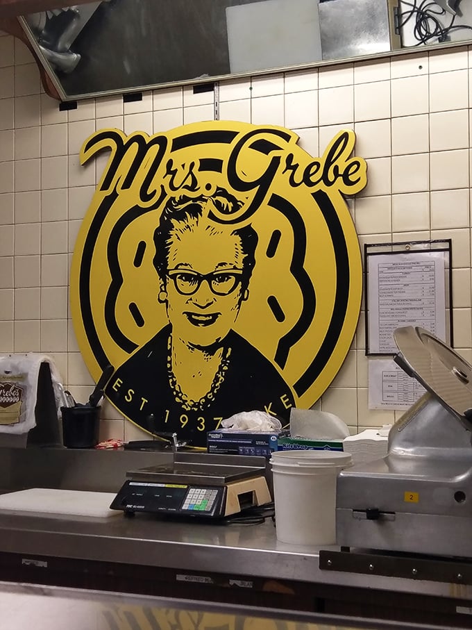 Meet the queen of quiche and countess of cakes! Mrs. Grebe's watchful gaze ensures every pastry passes the taste test.