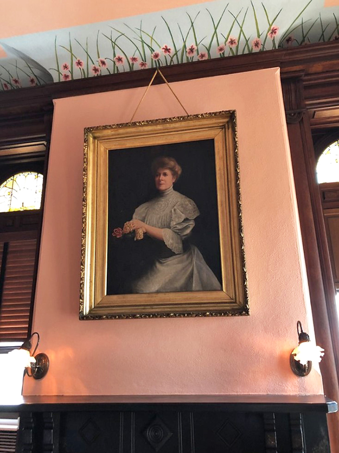 "If walls could talk, they'd probably gossip about this lady." Mrs. Gresham's portrait keeps a watchful eye on visitors, judging your outfit choices.
