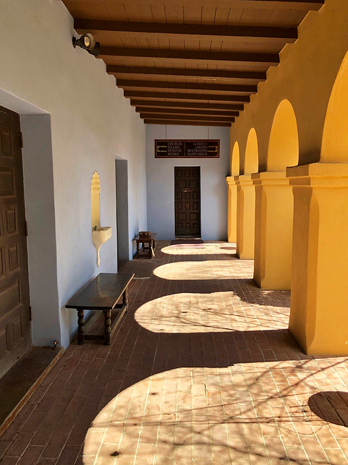 Sunlight paints patterns on this peaceful patio. It's like Mother Nature's own stained glass window, no cathedral required.