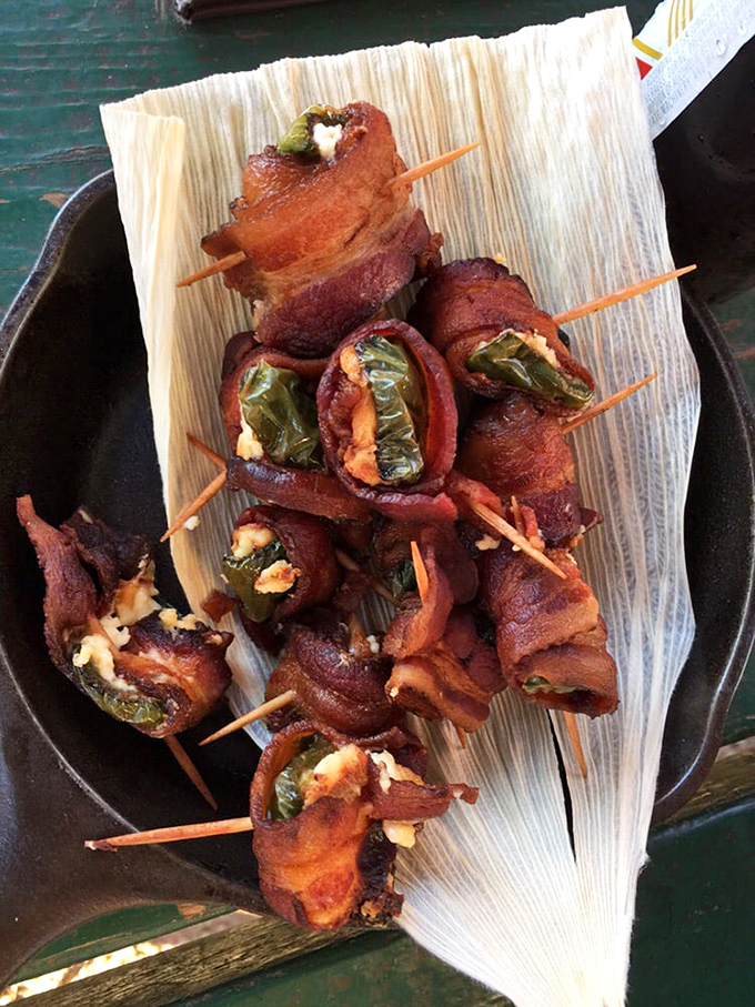 Rattlesnake bites that don't bite back! These bacon-wrapped jalape&ntilde;o poppers are hotter than a Texas summer, but twice as welcome.