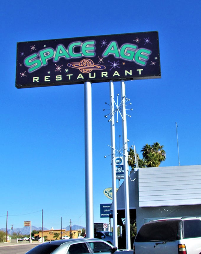 The bat-signal for hungry space cadets! This sign is your beacon to a universe of comfort food and cosmic fun.