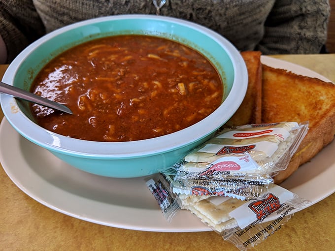 Soup's on! This hearty bowl of goodness is like a warm hug for your taste buds. Paired with buttery toast, it's the ultimate comfort food combo.