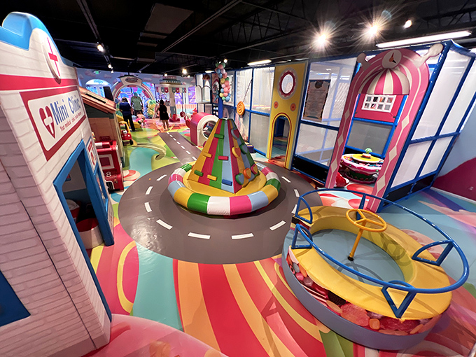 Bird's eye view of candy paradise! This top-down shot reveals a layout that's part theme park, part board game, and all fun.