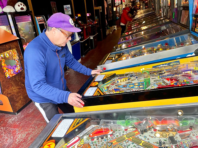 "Just one more game," said everyone ever. This gentleman's intense focus is all of us trying to beat our personal best.