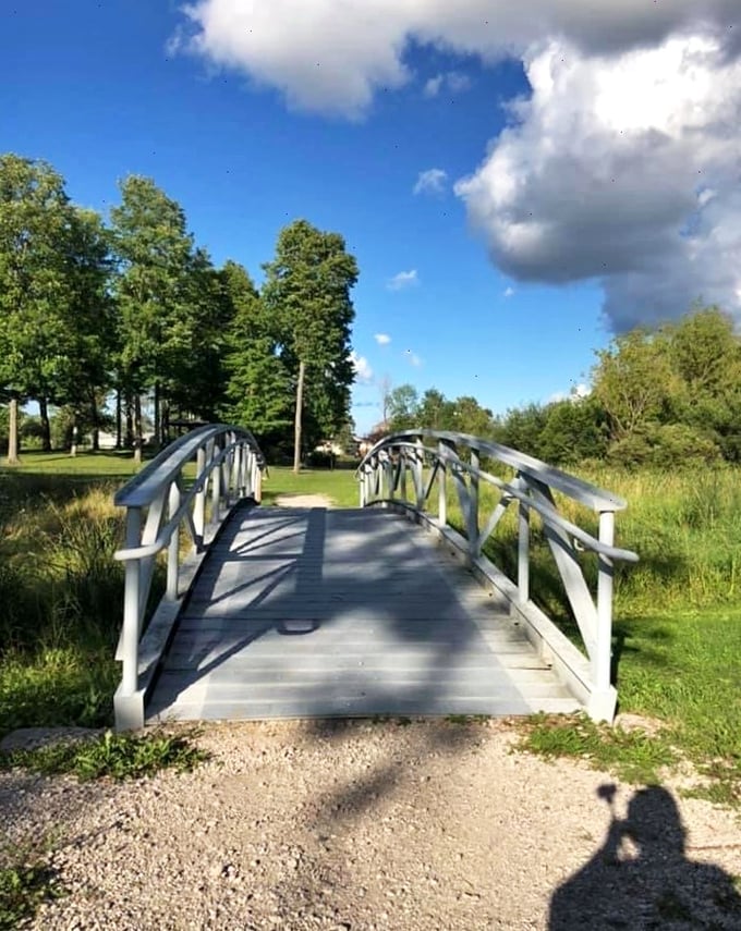 Bridge over untroubled waters! This charming walkway invites visitors to cross into Awakon Park's world of wonder.