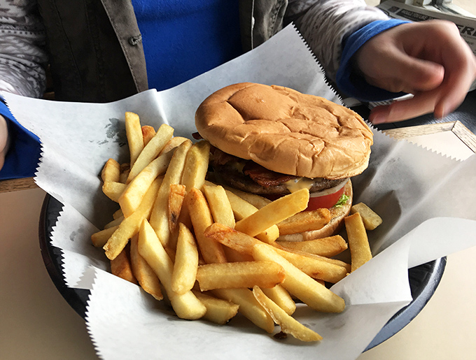 Burger bliss! This hand-held masterpiece is giving "meat and greet" a whole new meaning.