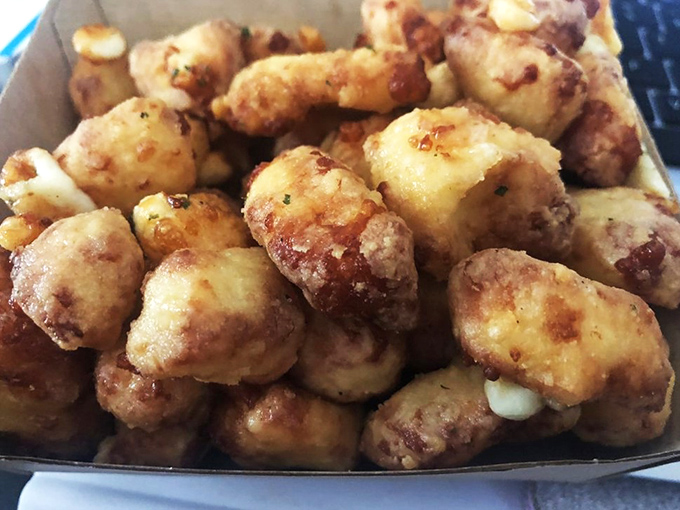 Say cheese! These gooey morsels are so irresistible, they should come with a warning label: "May cause spontaneous happy dances."