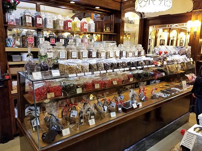 Behold, the Great Wall of Candy! This display case is basically a stained glass window, but instead of saints, it's got chocolate-covered everything.