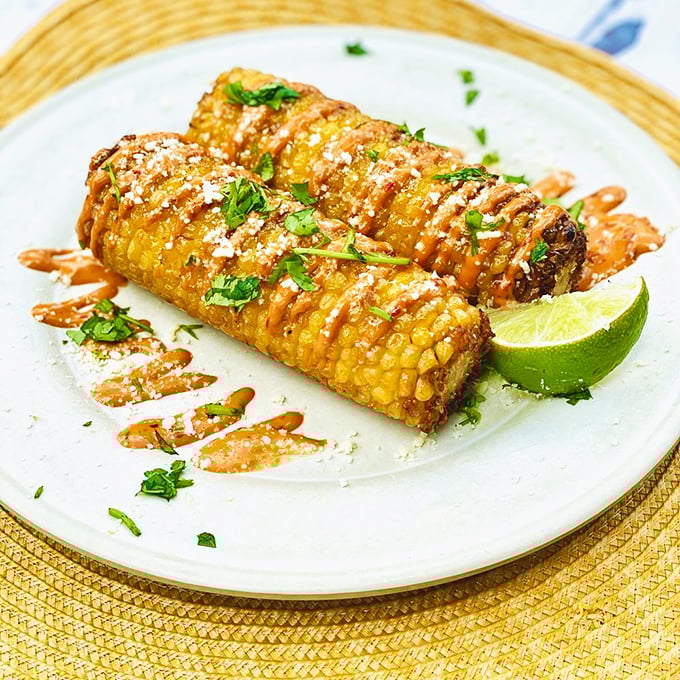 Corn-ucopia of flavor! This elote is dressed up and ready to party, bringing street food chic to your plate.