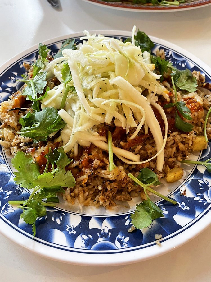 Fried rice nirvana! This colorful dish is like a party on a plate. Every forkful is a celebration of texture and taste.