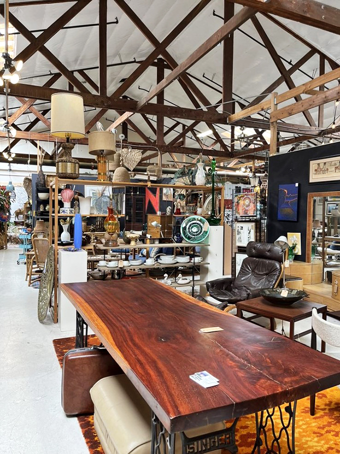 A feast for the eyes! This eclectic mix of furniture and decor is like a time-traveler's mood board come to life.