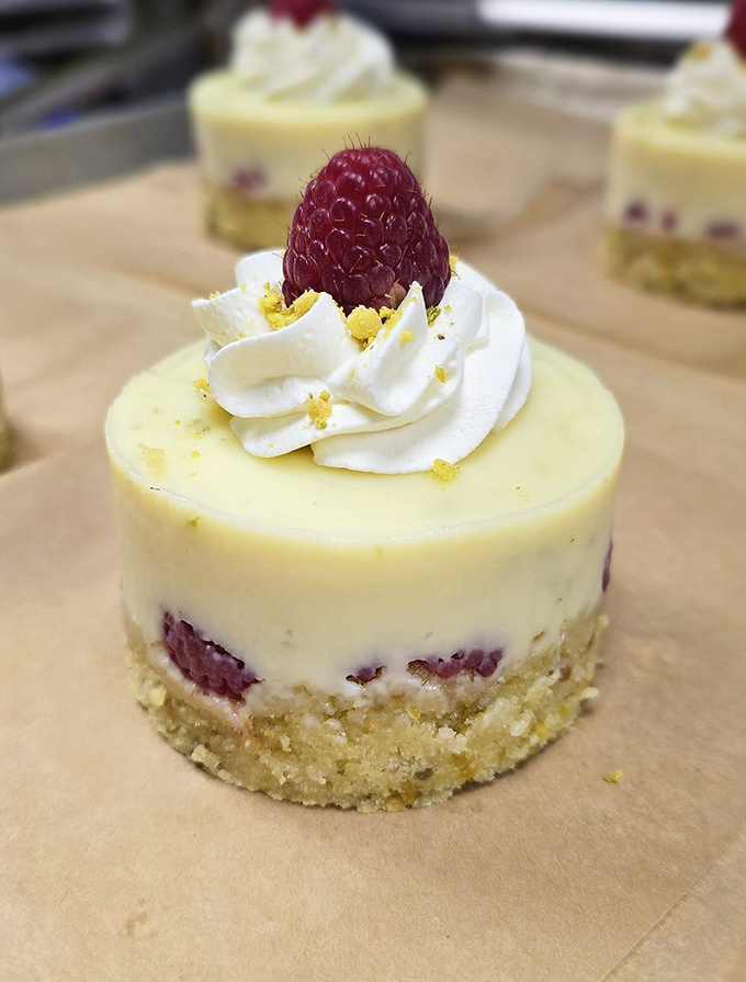 Hello, gorgeous! This zesty lime custard tart topped with a plump raspberry is summer on a plate. Pucker up, buttercup!