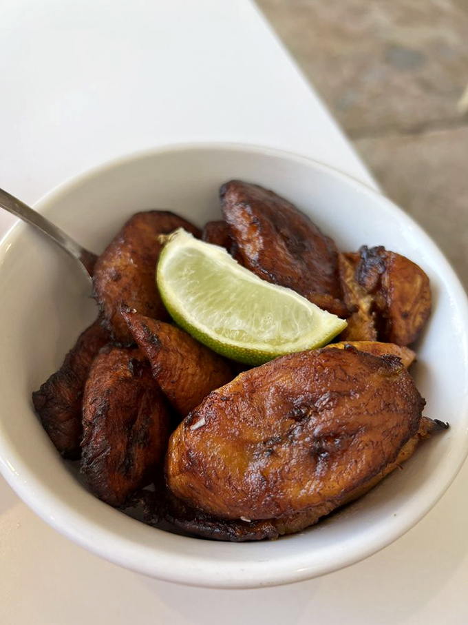 Holy plantains, Batman! These maduros are so perfectly caramelized, they could star in their own dessert show.