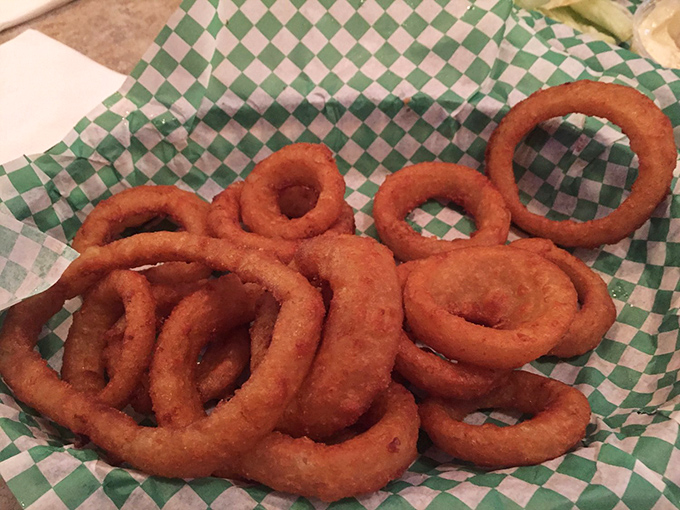 Onion rings so perfect, they could be Olympic rings. Crispy, golden, and deserving of a gold medal in deliciousness.