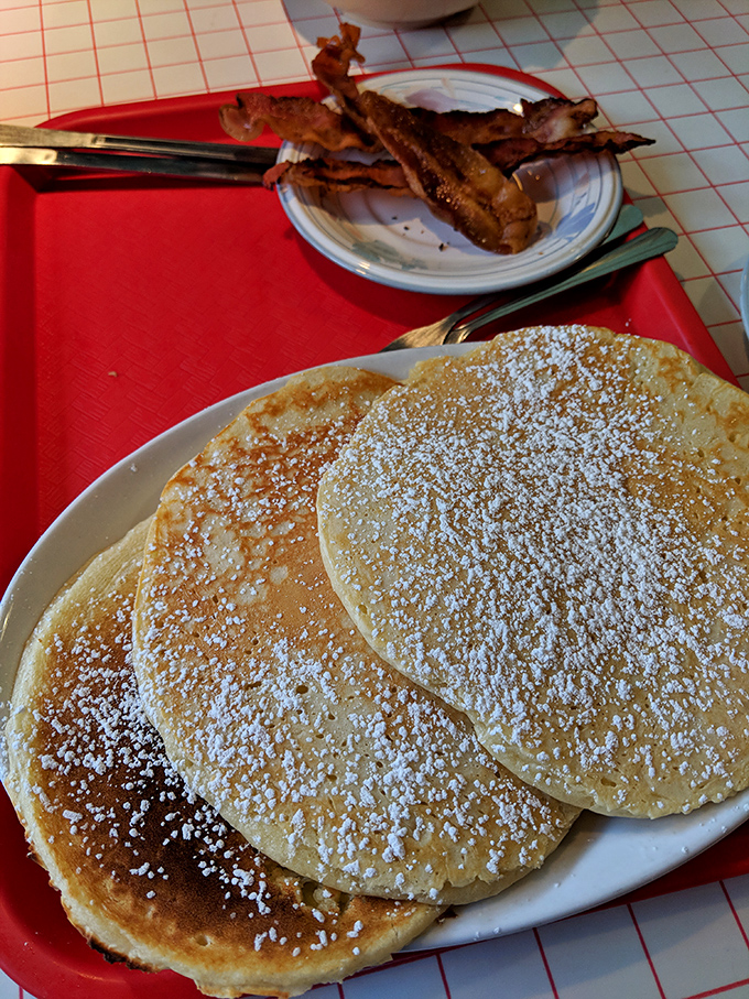 Pancakes so fluffy, they could double as pillows. Warning: May induce extreme comfort and the urge to cancel all plans.