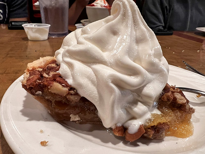 Pecan pie &agrave; la mode: where Southern charm meets Midwestern hospitality. It's like a warm hug for your taste buds.