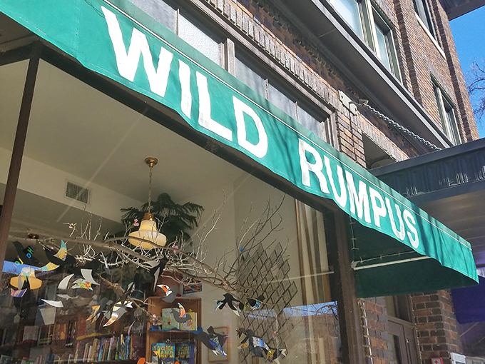 The Wild Rumpus sign: a beacon of hope for book lovers and a warning to those who think reading is boring. Prepare to have your mind changed!