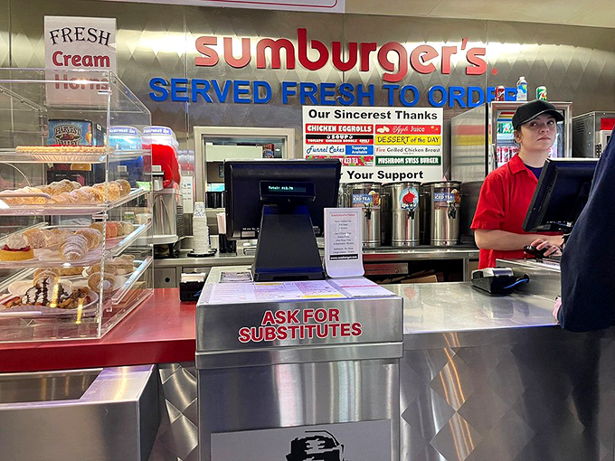 At the counter, where culinary dreams come true. It's like Willy Wonka's factory, but with less singing and more savory delights.
