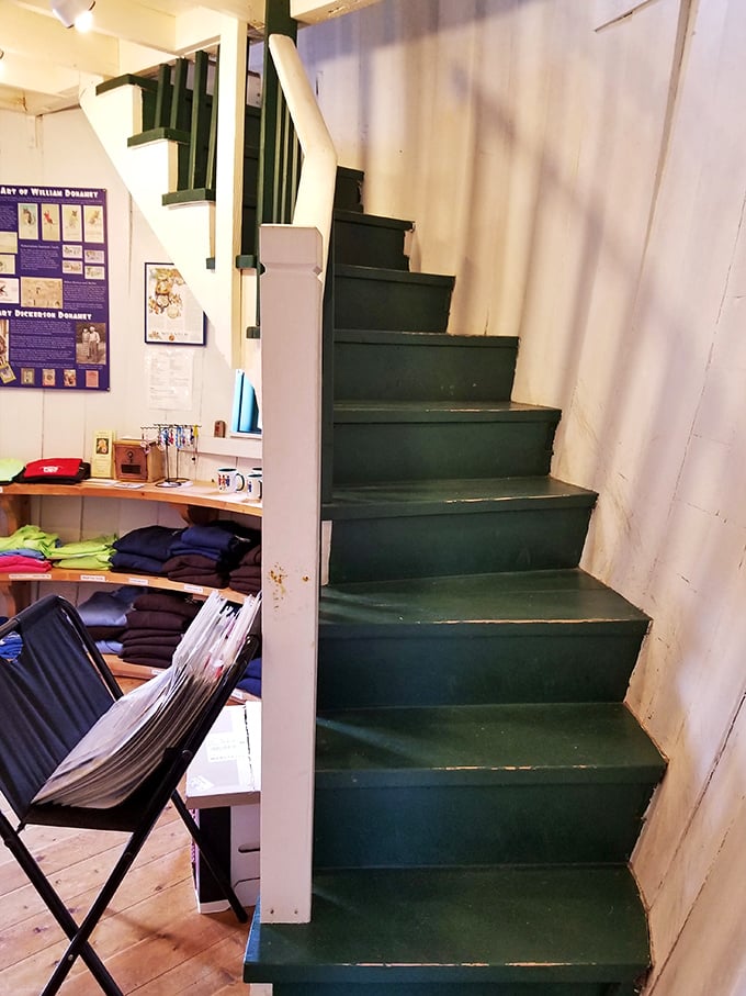 Stairway to pickle heaven! These green steps lead to the upper floor, where more barrel-shaped surprises await the curious visitor.