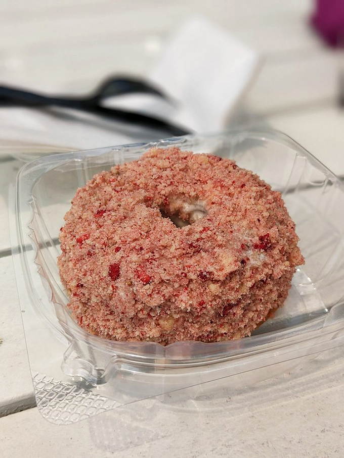 Talk about a pretty in pink moment! This strawberry shortcake donut looks like it stepped right out of a 1950s soda shop fantasy. It's not just a treat; it's a time machine for your taste buds.
