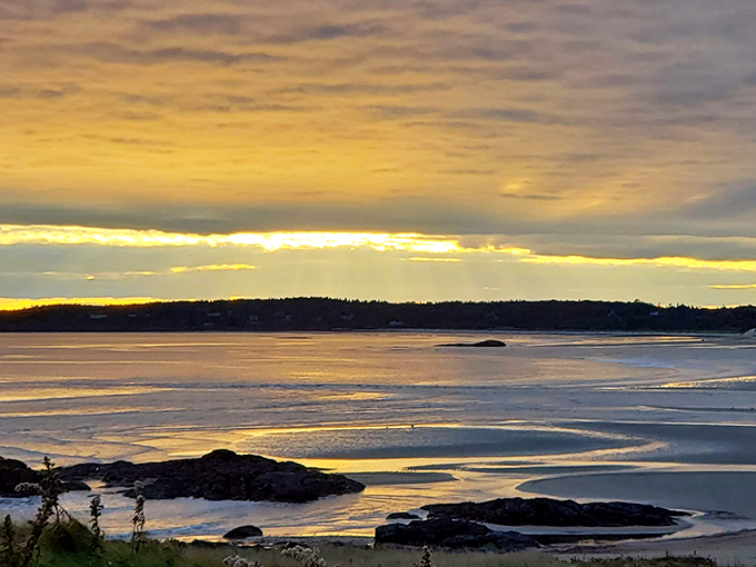 Mother Nature's grand finale: a Popham Beach sunset. It's like the sky decided to throw a party and invited all the best colors.