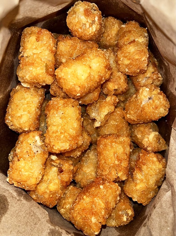 Tater tot jackpot! These golden nuggets of potato-y perfection are like the supporting actors that steal the show. Oscar-worthy sides, anyone?
