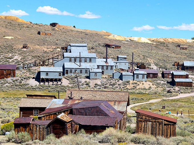 "A town with a serious case of the blues." The Standard Mill's white buildings pop against the azure sky, a ghostly beacon in the desert.