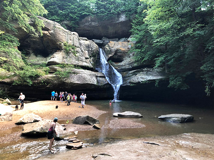 Crowd-sourcing serenity at Cedar Falls. These visitors are soaking up nature's own IMAX experience, no 3D glasses needed.