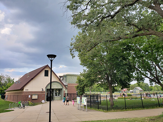 Gateway to summer! Webber Pool's welcoming entrance promises a day of natural swimming, family fun, and memories that'll last long after the tan fades.