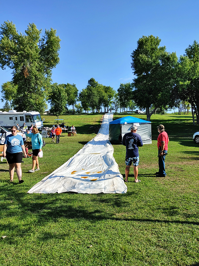 Slip and slide into fun! This giant waterslide proves that at Shady Hollow, bargain hunting isn't the only way to make a splash.