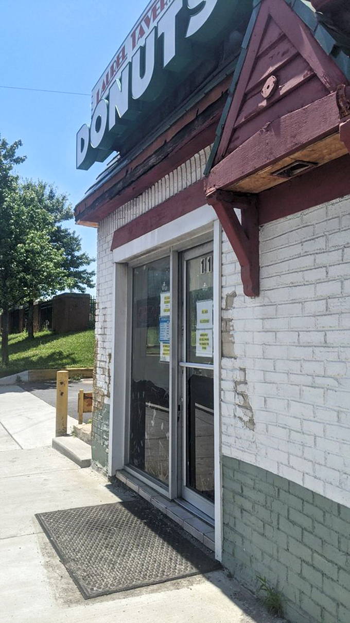 The gateway to gastronomy! This unassuming entrance is like Platform 9¾ for foodies, transporting you to a world of sugary delights.