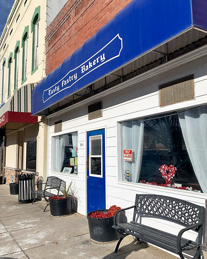 The bakery's siren call: That blue awning is like a beacon of hope for the sugar-deprived. Resistance is futile!