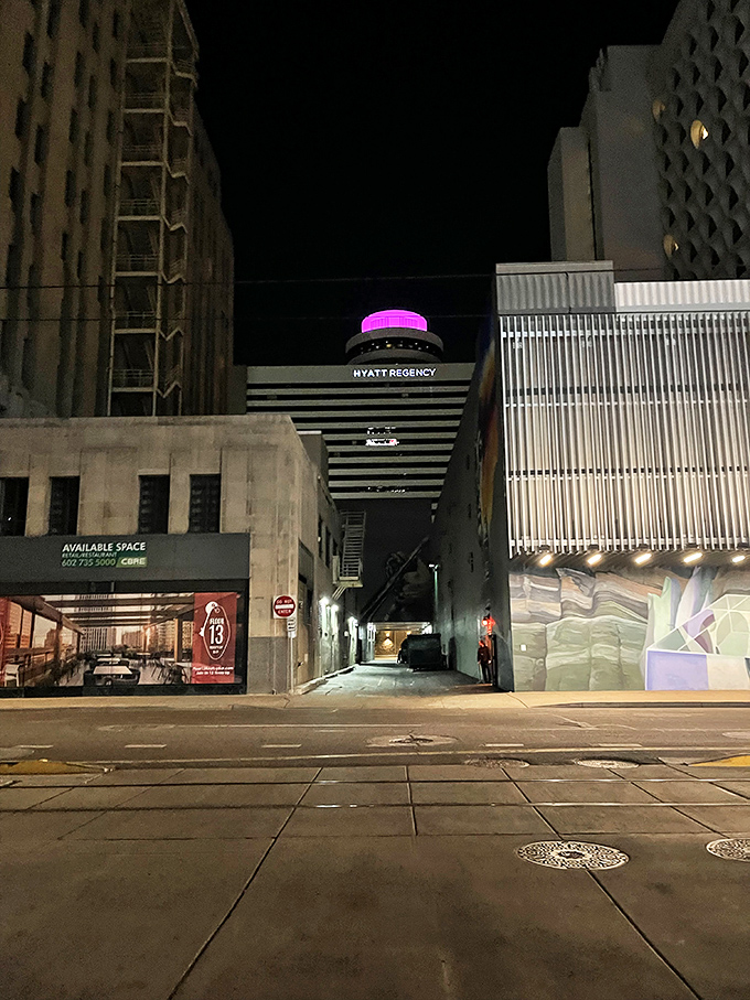 Follow the purple glow to find your new favorite haunt. This unassuming alley leads to a world of cocktail wonders.