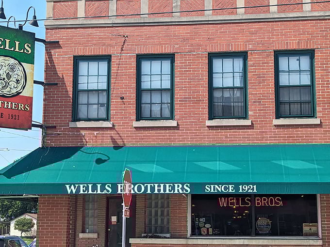 Pizza paradise found! This unassuming exterior hides a world of cheesy wonders. Remember, folks: Never judge a pizzeria by its awning!