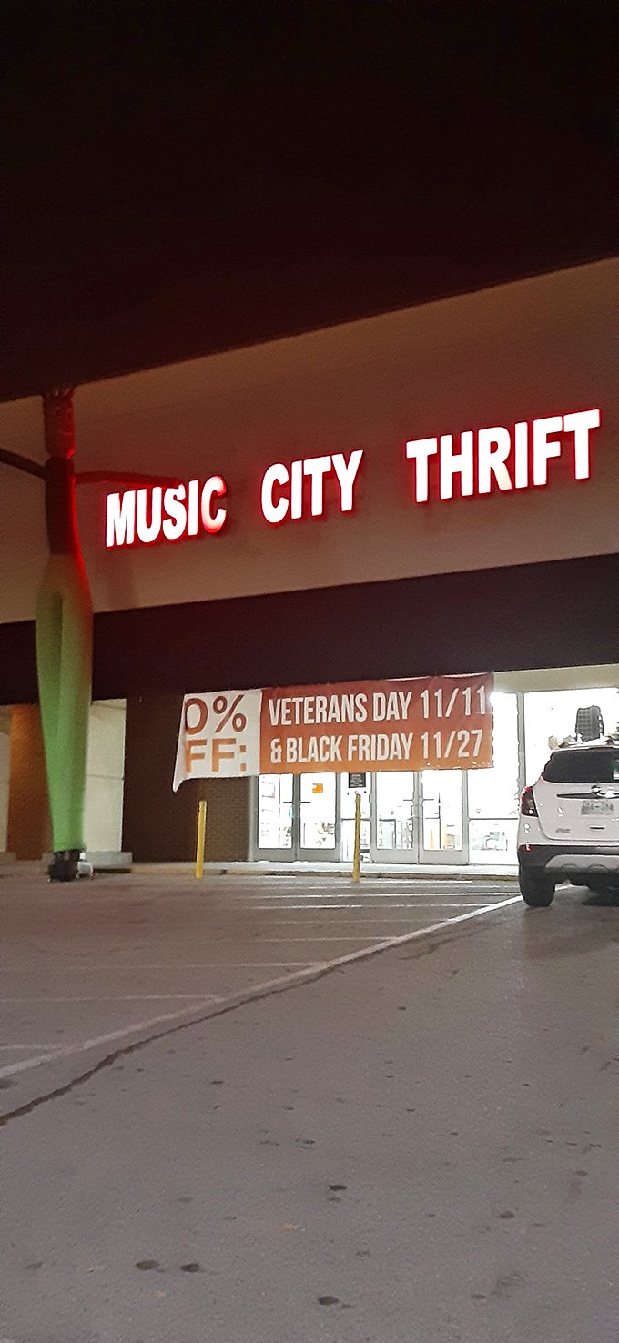 "By day, a thrift store. By night, a beacon of bargains." Music City Thrift's neon sign glows like a lighthouse, guiding deal-seekers home.